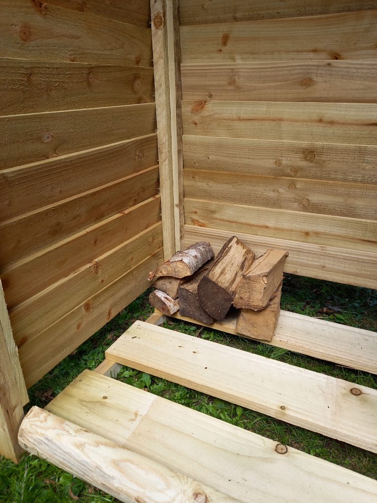 Tall slatted log store,space saving design,High build quality